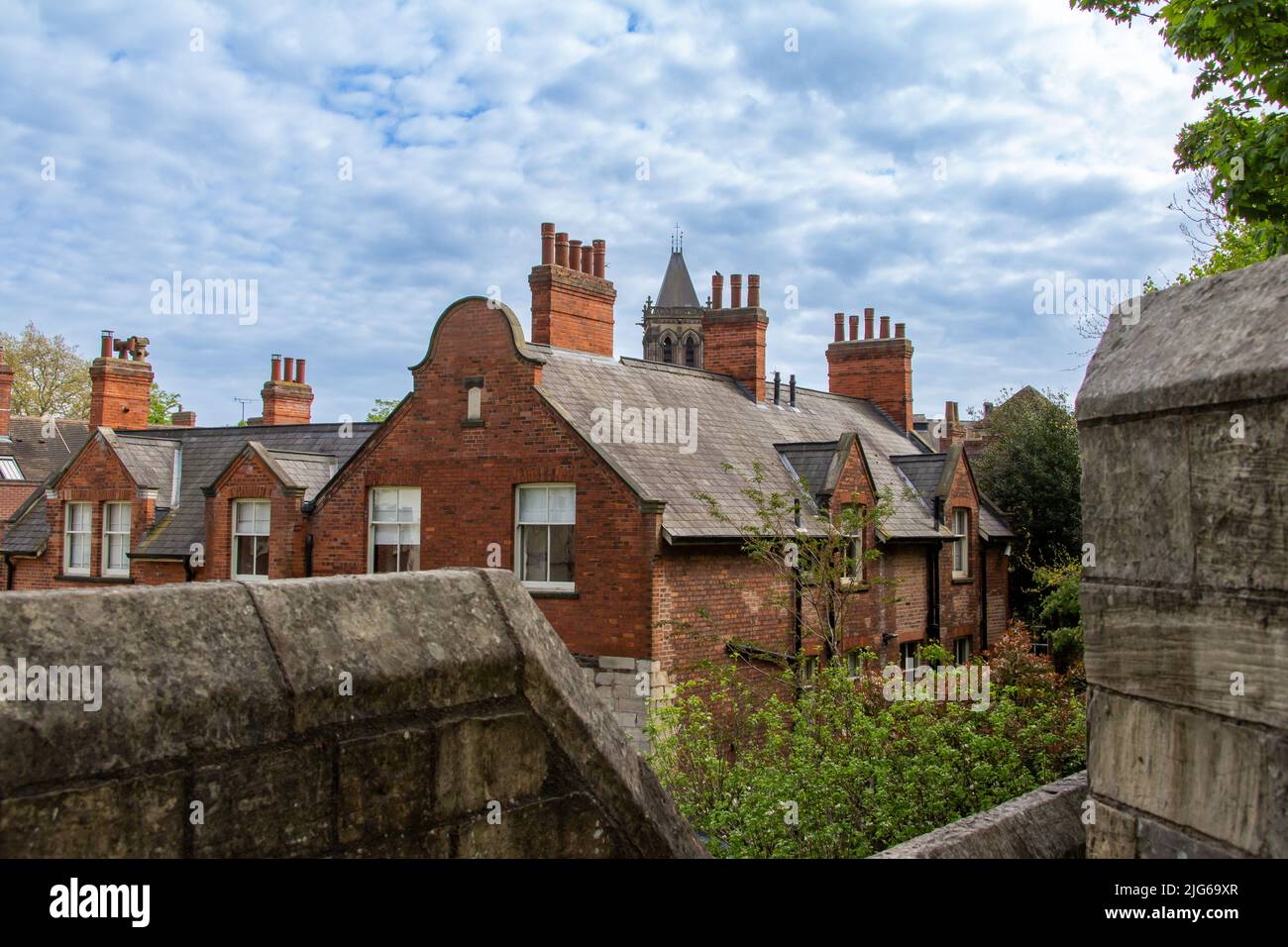 Cityscape view of York, England from atop the medieval city stone walls ...