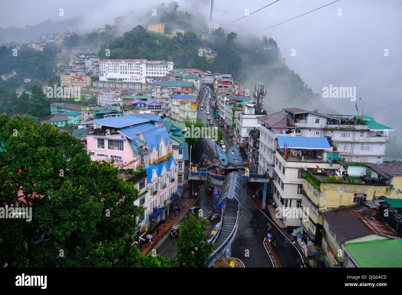 Gangtok, Sikkim - June 16 2022, Tourists enjoy a ropeway cable car ride ...