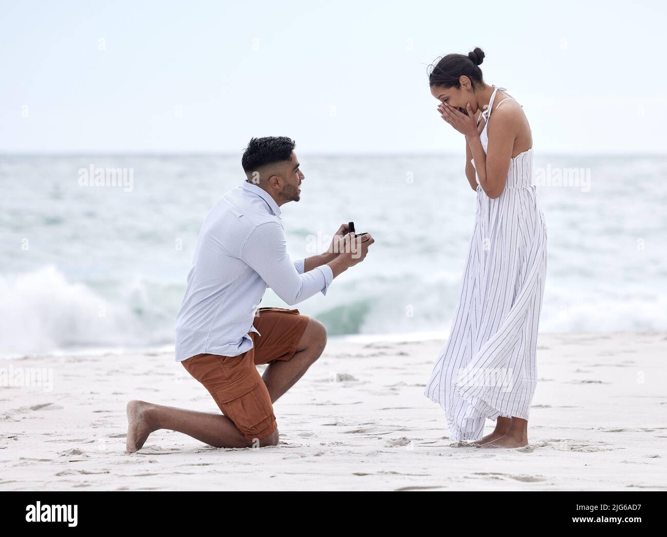 Will you marry me. Full length shot of a handsome young man proposing ...