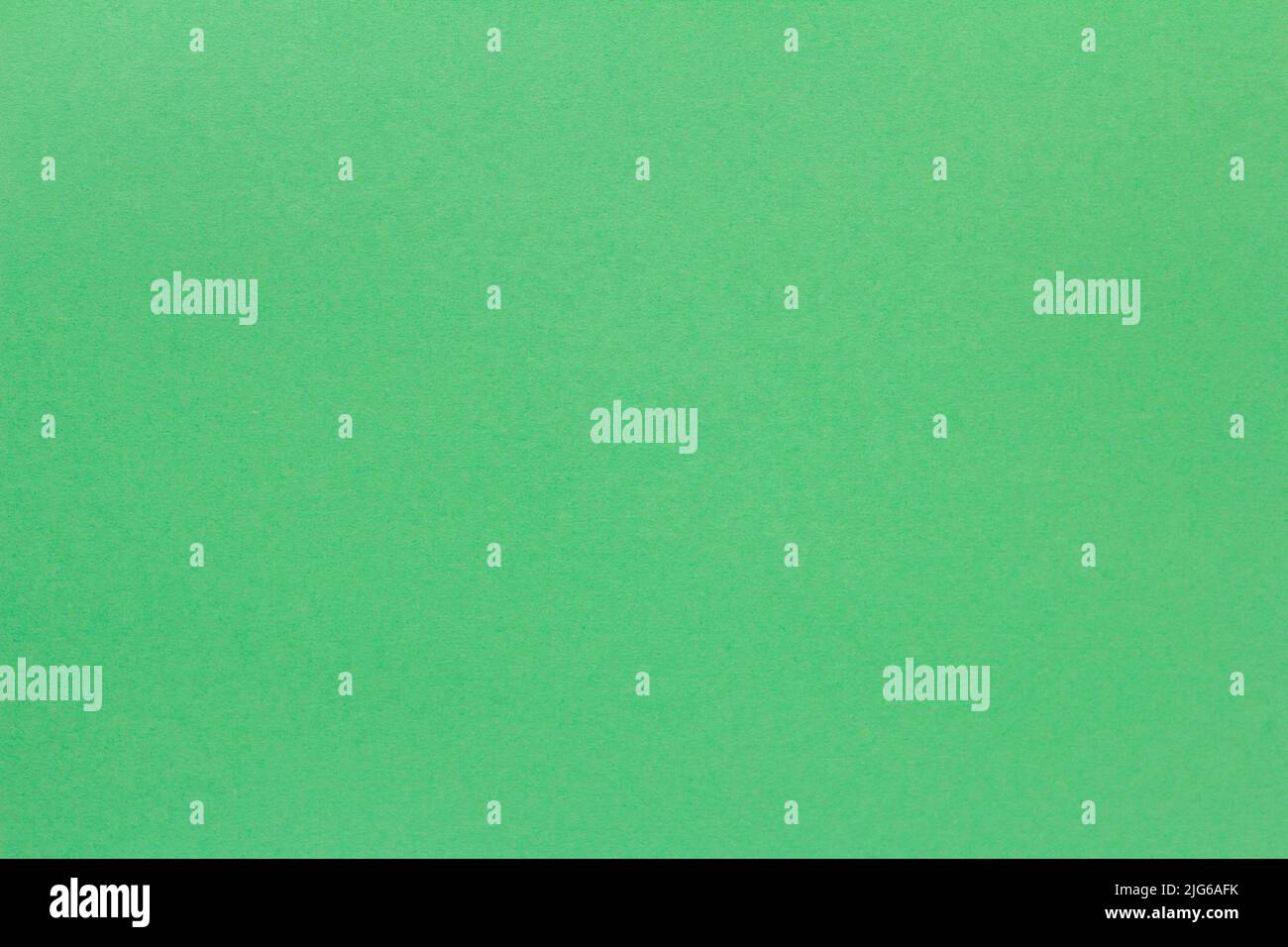 Green paper background.The texture of thick green paper for creativity ...