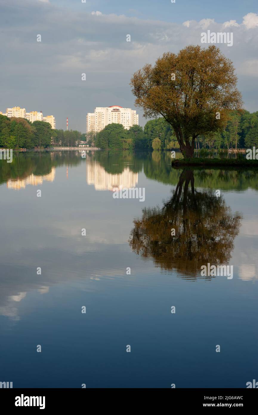 Landscape with a lake in the early morning in the city park of Minsk ...