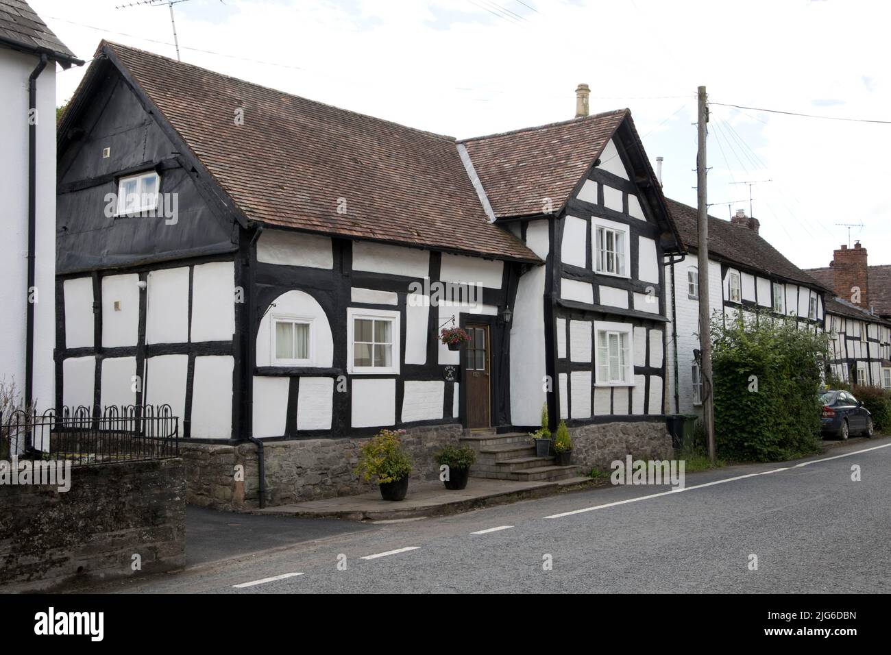 Medieval black and white half timbered houses in the mediaeval village ...