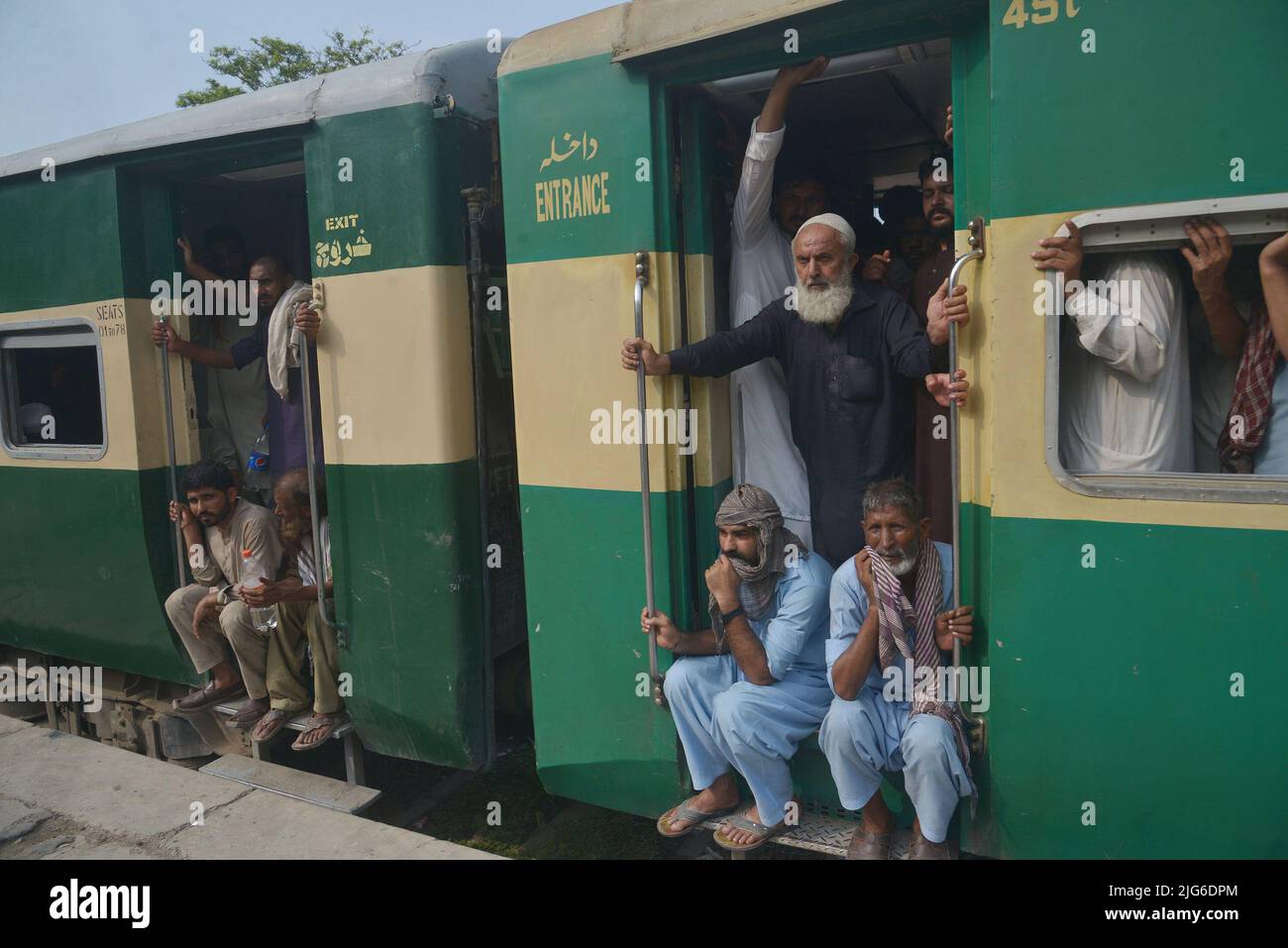 Pakistan, 07/07/2022, Pakistani people boarding on the roof top of a ...
