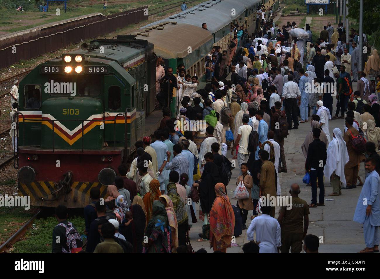 Pakistan, 07/07/2022, Pakistani people boarding on the roof top of a ...