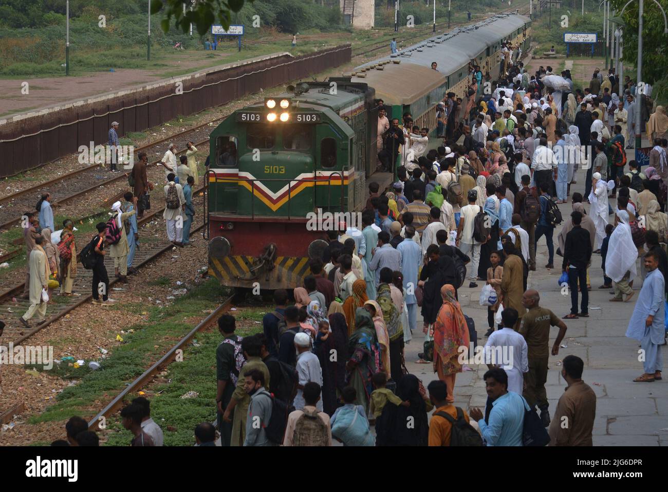 Pakistan, 07/07/2022, Pakistani people boarding on the roof top of a ...