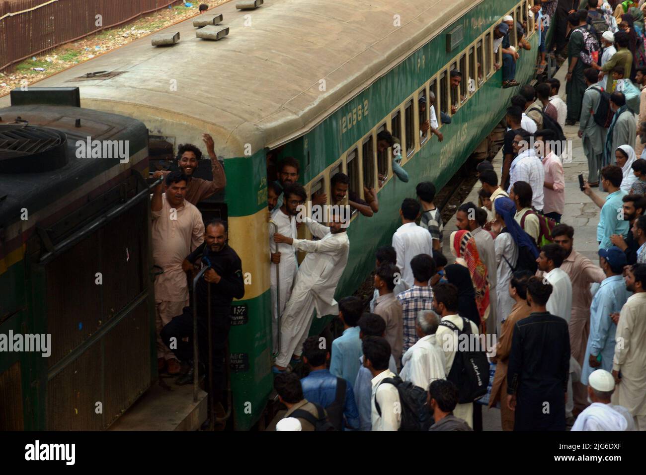 Pakistan, 07/07/2022, Pakistani people boarding on the roof top of a ...