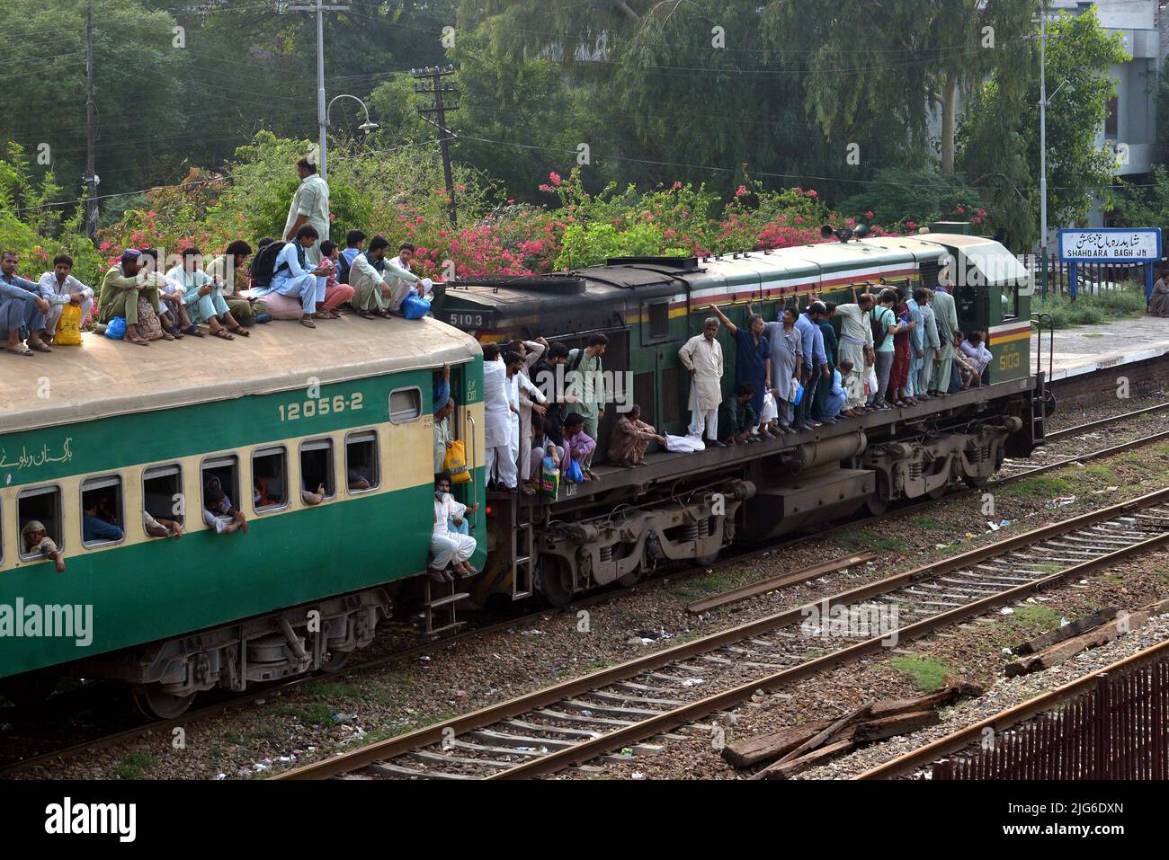 Pakistan, 07/07/2022, Pakistani people boarding on the roof top of a ...