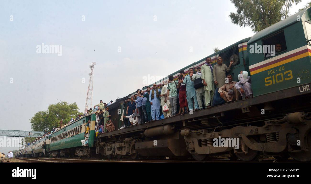 Pakistan, 07/07/2022, Pakistani people boarding on the roof top of a ...