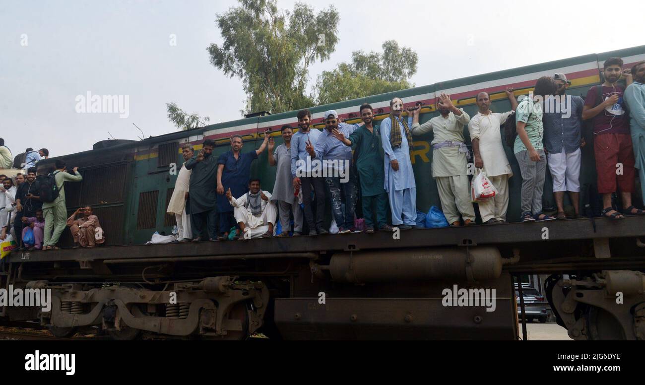 Pakistan, 07/07/2022, Pakistani people boarding on the roof top of a ...