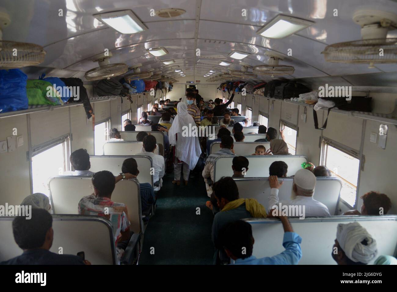 Pakistan, 07/07/2022, Pakistani people boarding on the roof top of a ...