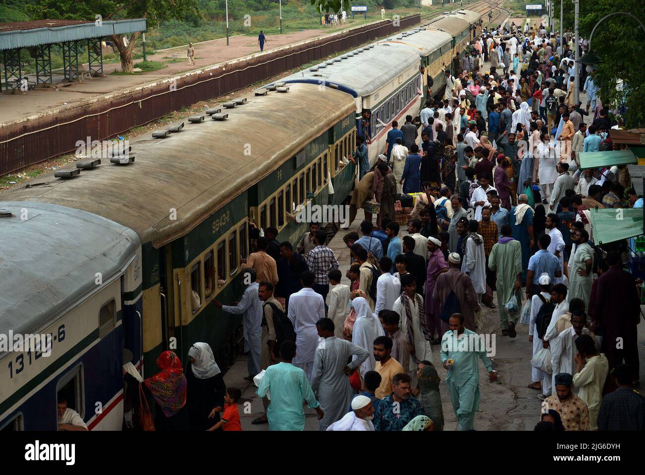 Pakistan, 07/07/2022, Pakistani people boarding on the roof top of a ...