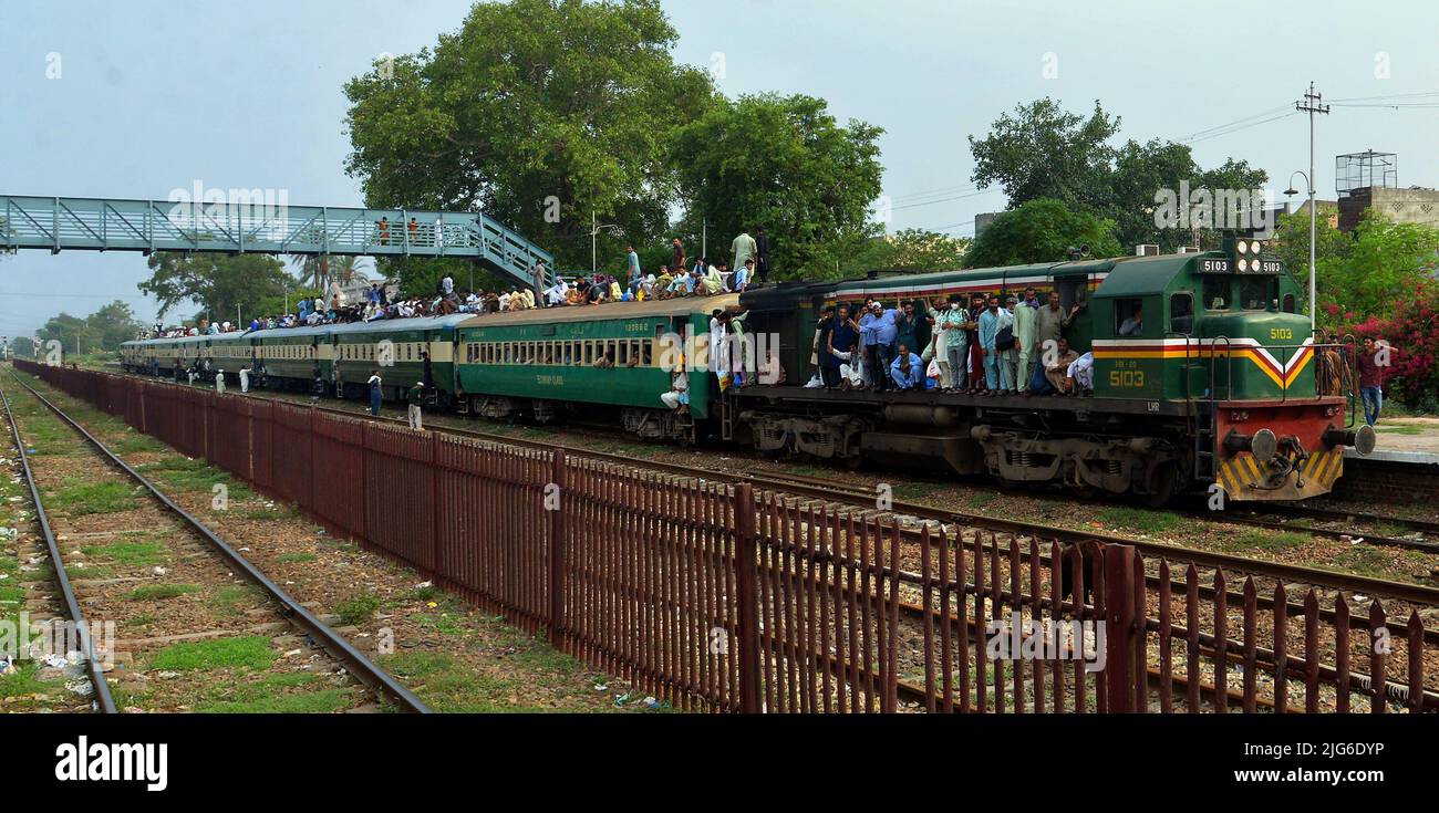 Pakistan, 07/07/2022, Pakistani people boarding on the roof top of a ...