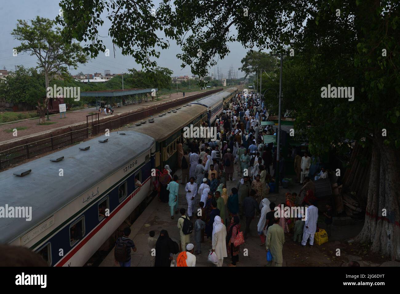 Pakistan, 07/07/2022, Pakistani people boarding on the roof top of a ...