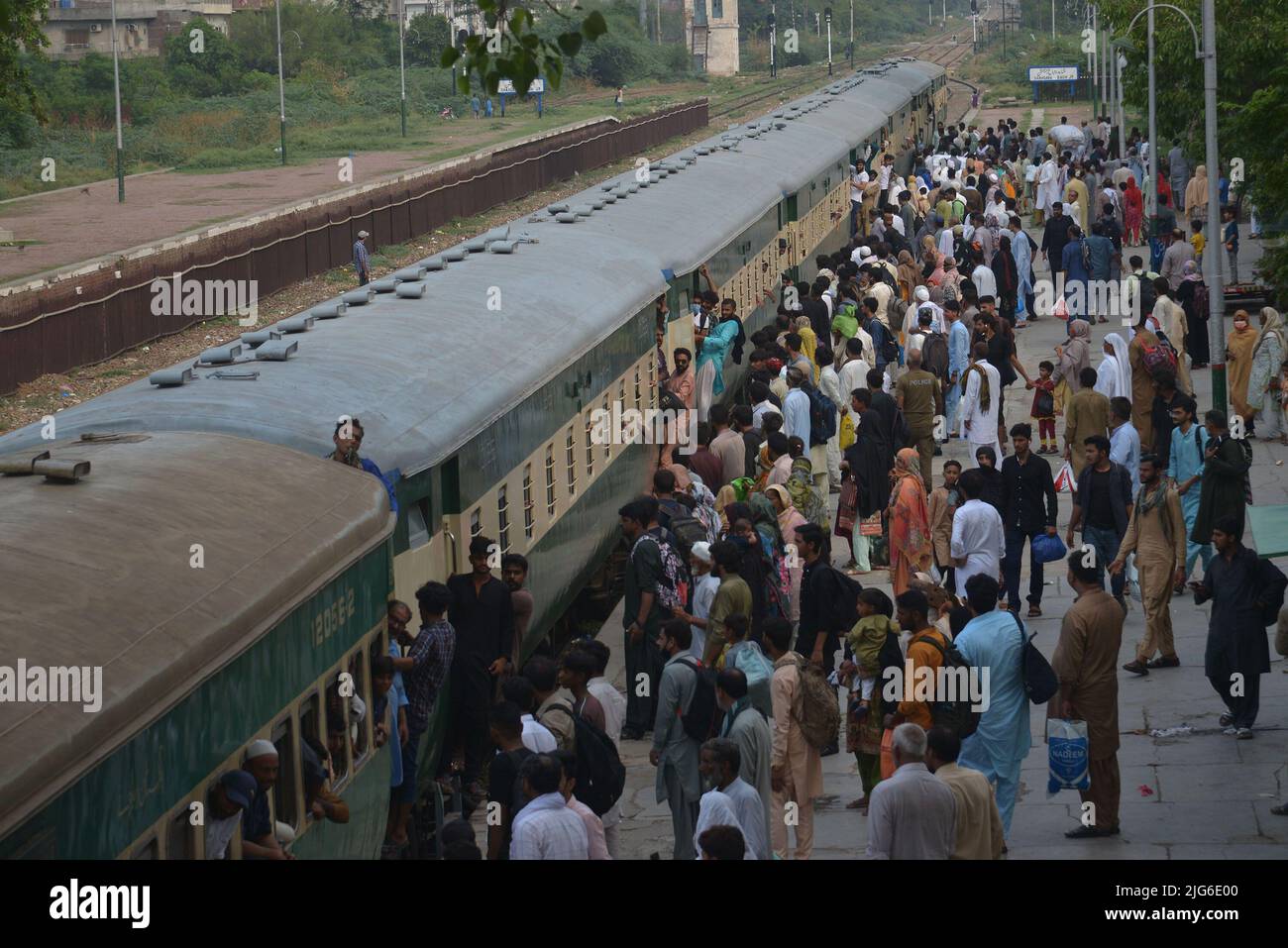 Pakistan, 07/07/2022, Pakistani people boarding on the roof top of a ...