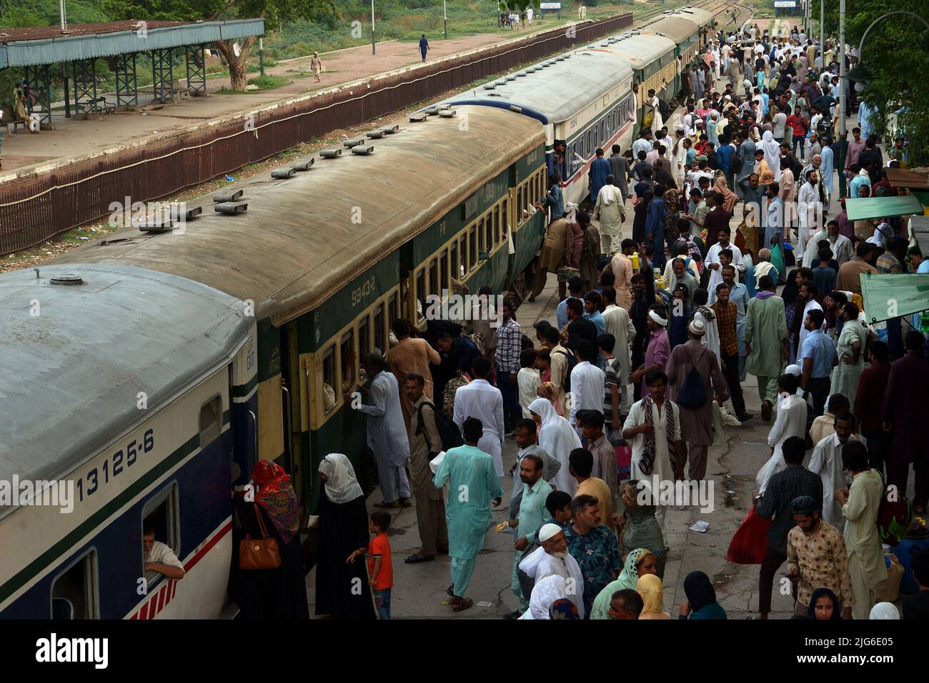Pakistan, 07/07/2022, Pakistani people boarding on the roof top of a ...