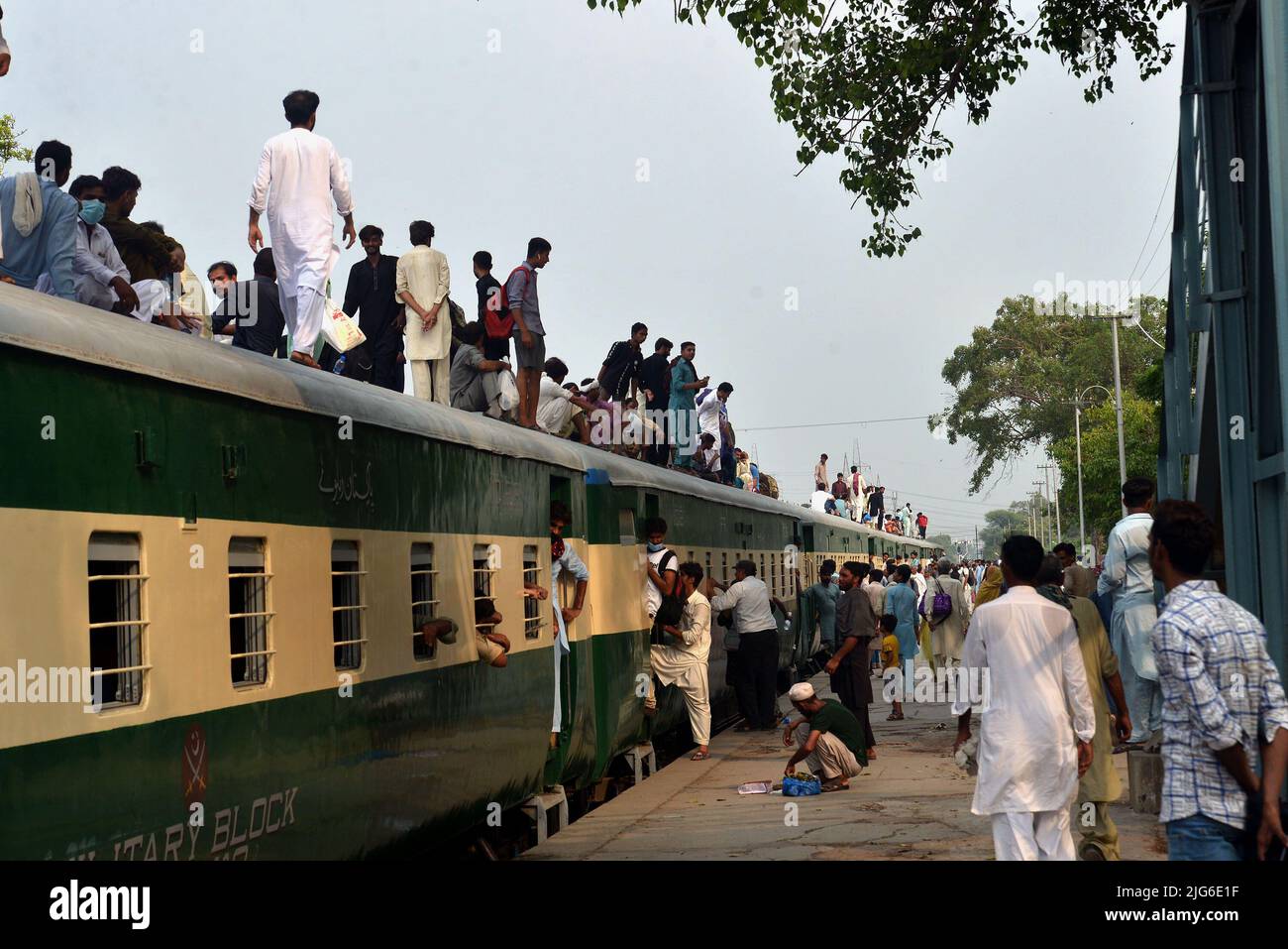 Pakistan, 07/07/2022, Pakistani people boarding on the roof top of a ...