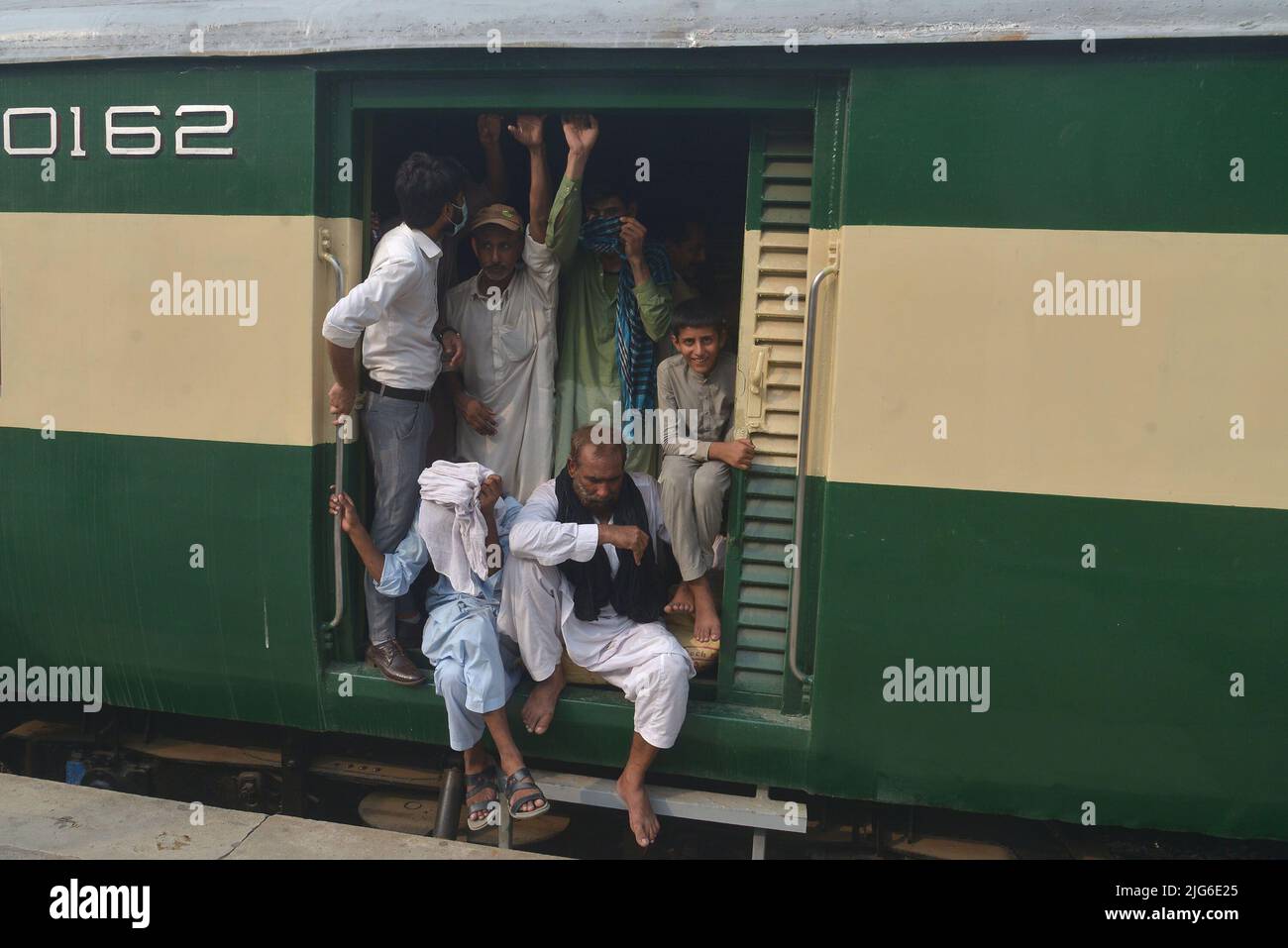 Pakistan, 07/07/2022, Pakistani people boarding on the roof top of a ...