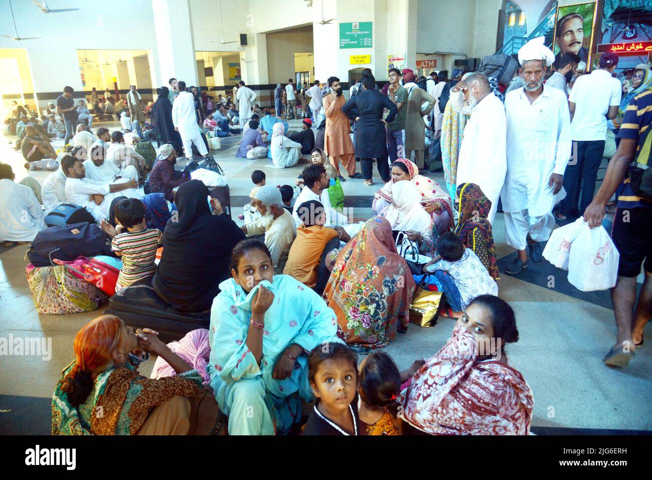 Lahore, Punjab, Pakistan: July 7, 2022, Pakistani people boarding on ...