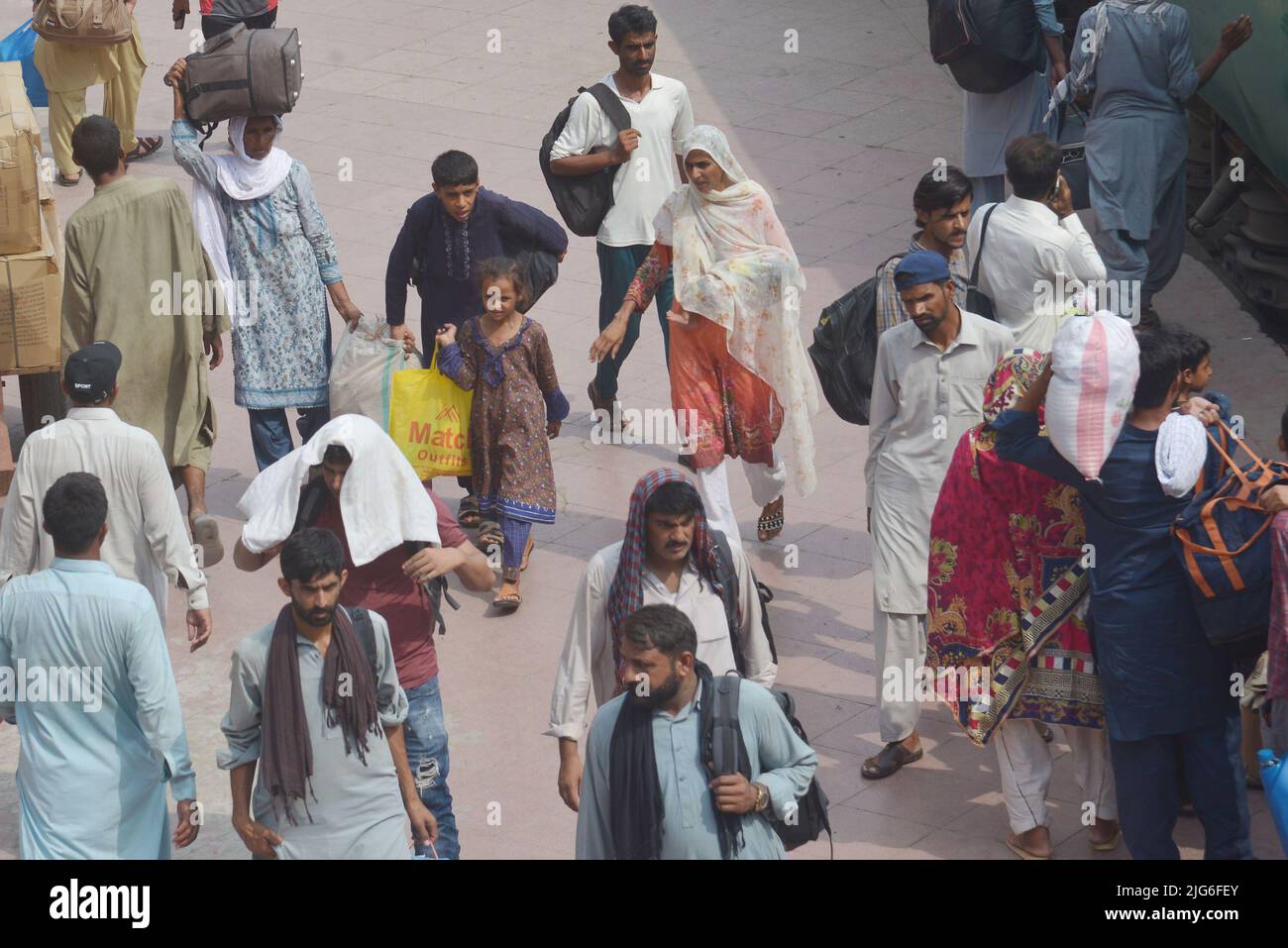 Lahore, Punjab, Pakistan: July 7, 2022, Pakistani people boarding on ...