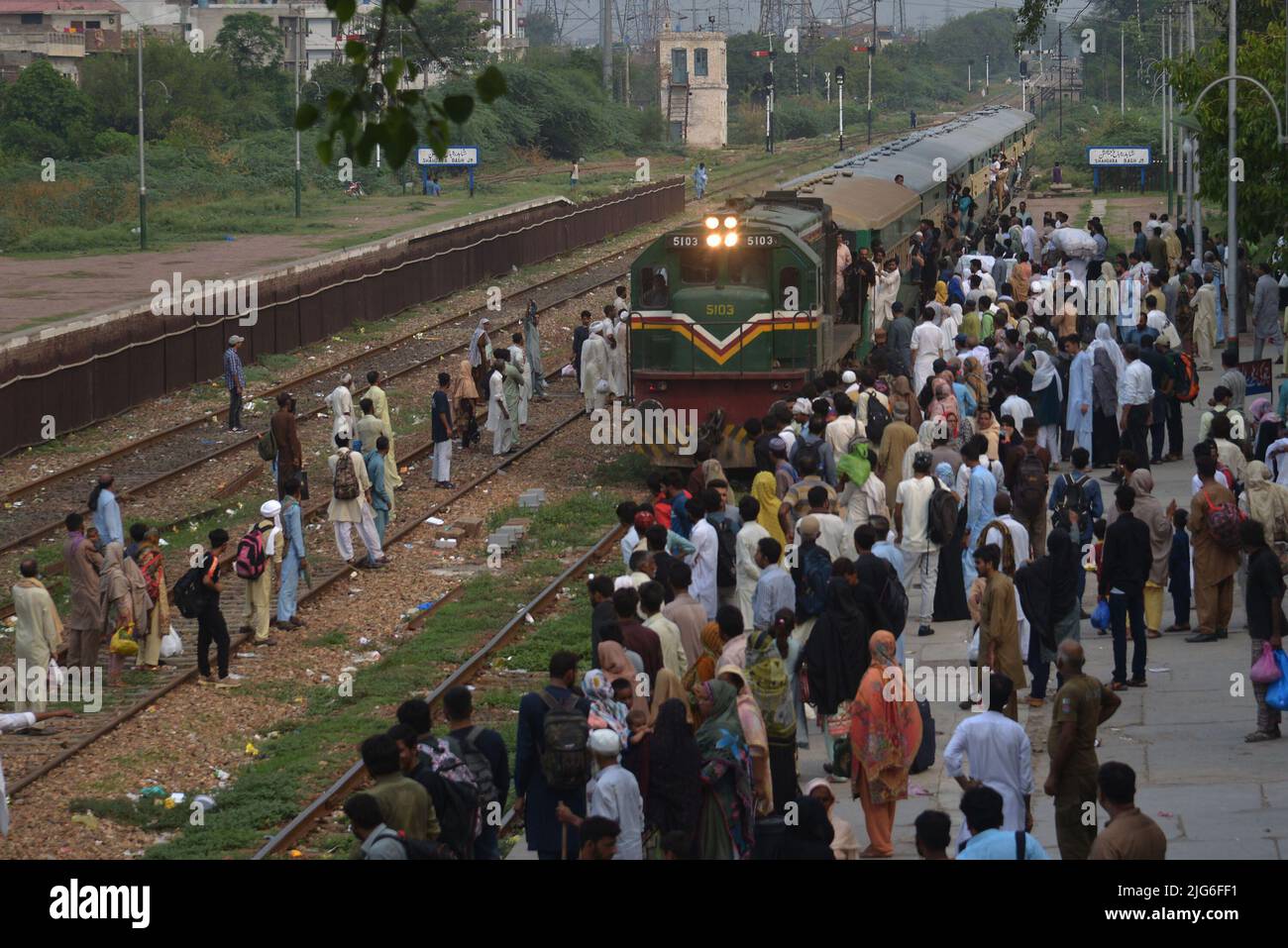 Lahore, Punjab, Pakistan: July 7, 2022, Pakistani people boarding on ...