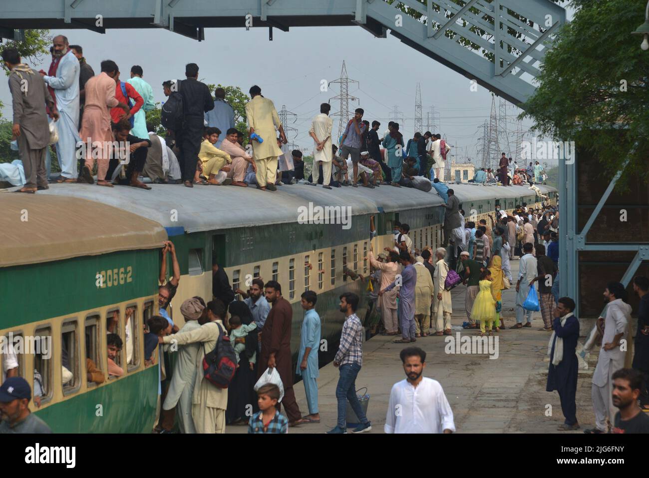 Lahore, Punjab, Pakistan: July 7, 2022, Pakistani people boarding on ...