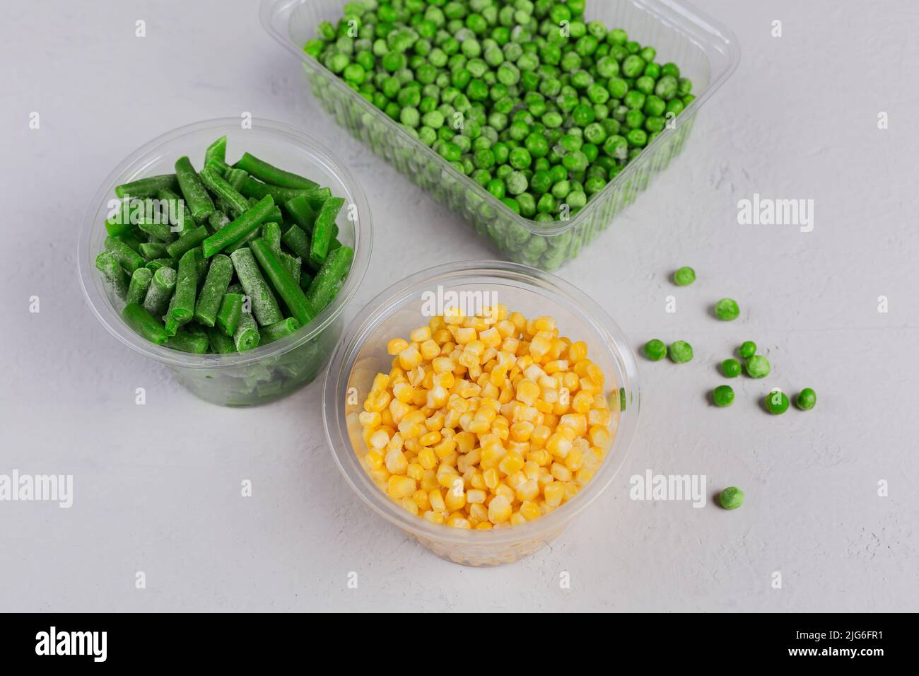 Plastic container with different organic deep frozen vegetables Stock ...