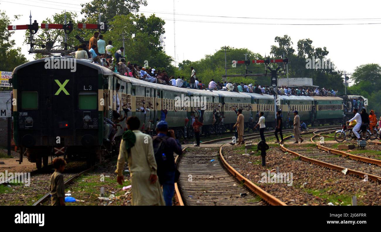 Lahore, Punjab, Pakistan: July 7, 2022, Pakistani people boarding on ...