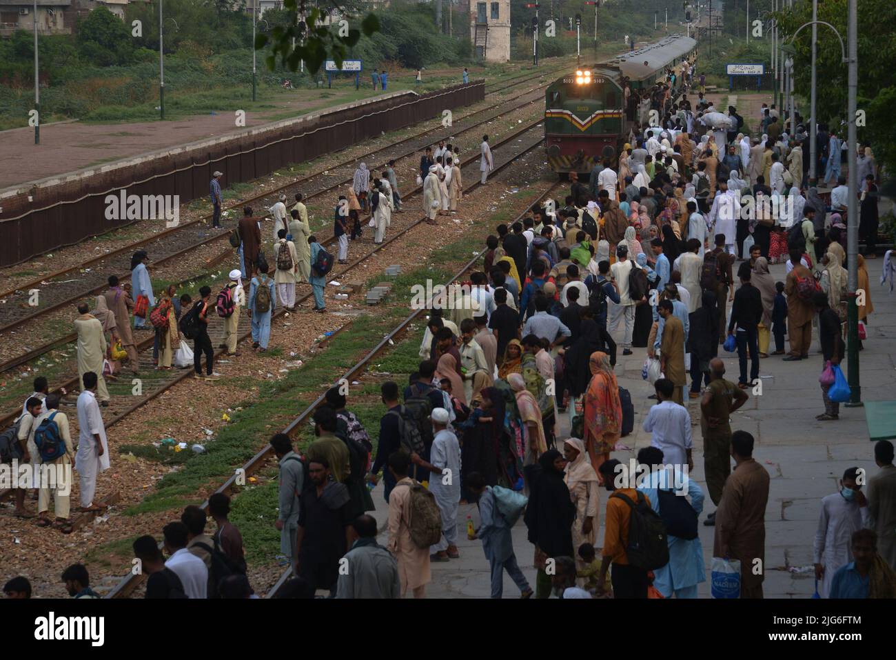 Lahore, Punjab, Pakistan: July 7, 2022, Pakistani people boarding on ...