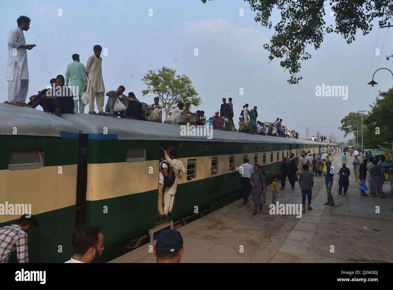 Lahore, Punjab, Pakistan: July 7, 2022, Pakistani people boarding on ...