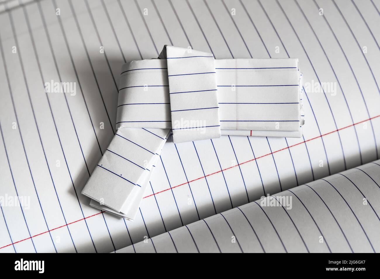 Gun toy folded from paper Stock Photo - Alamy