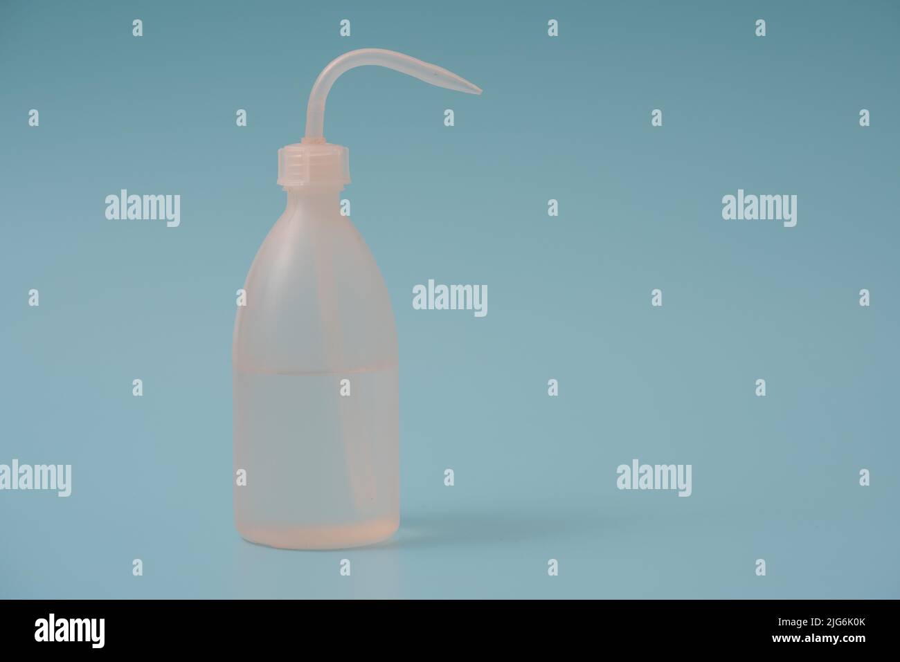 plastic laboratory dispenser with chemical liquid Stock Photo - Alamy
