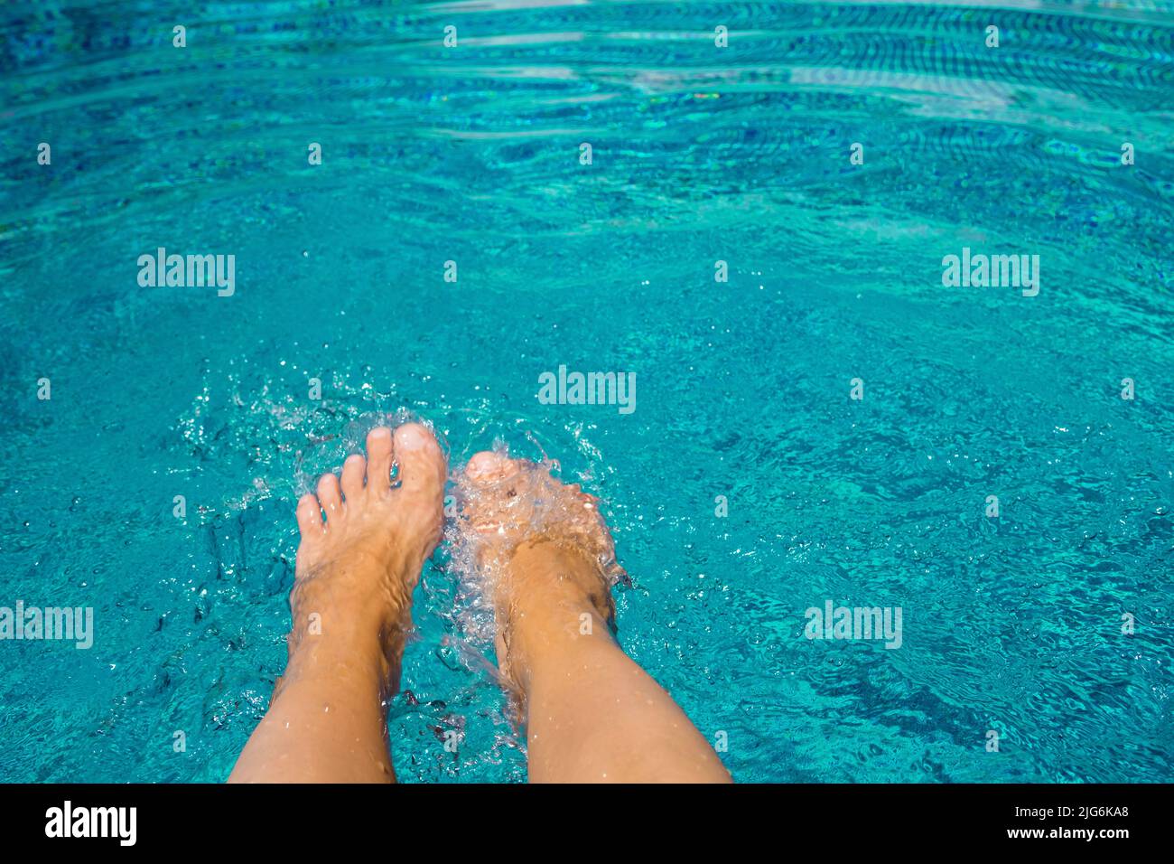 Female feet in blue water pool. Vacation at summer holiday Stock Photo ...