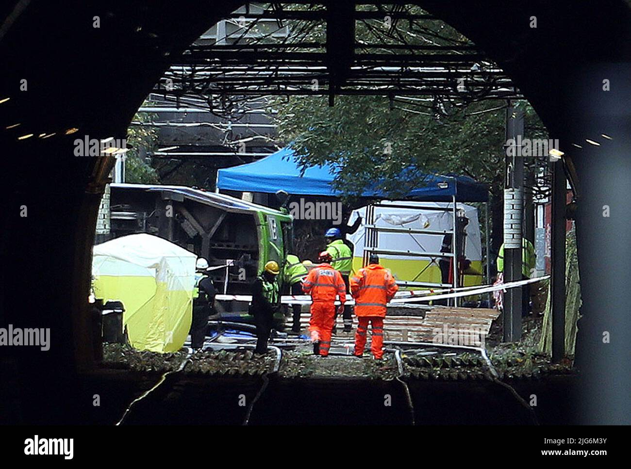 File photo dated 10/11/16 of investigators at the scene after a tram ...