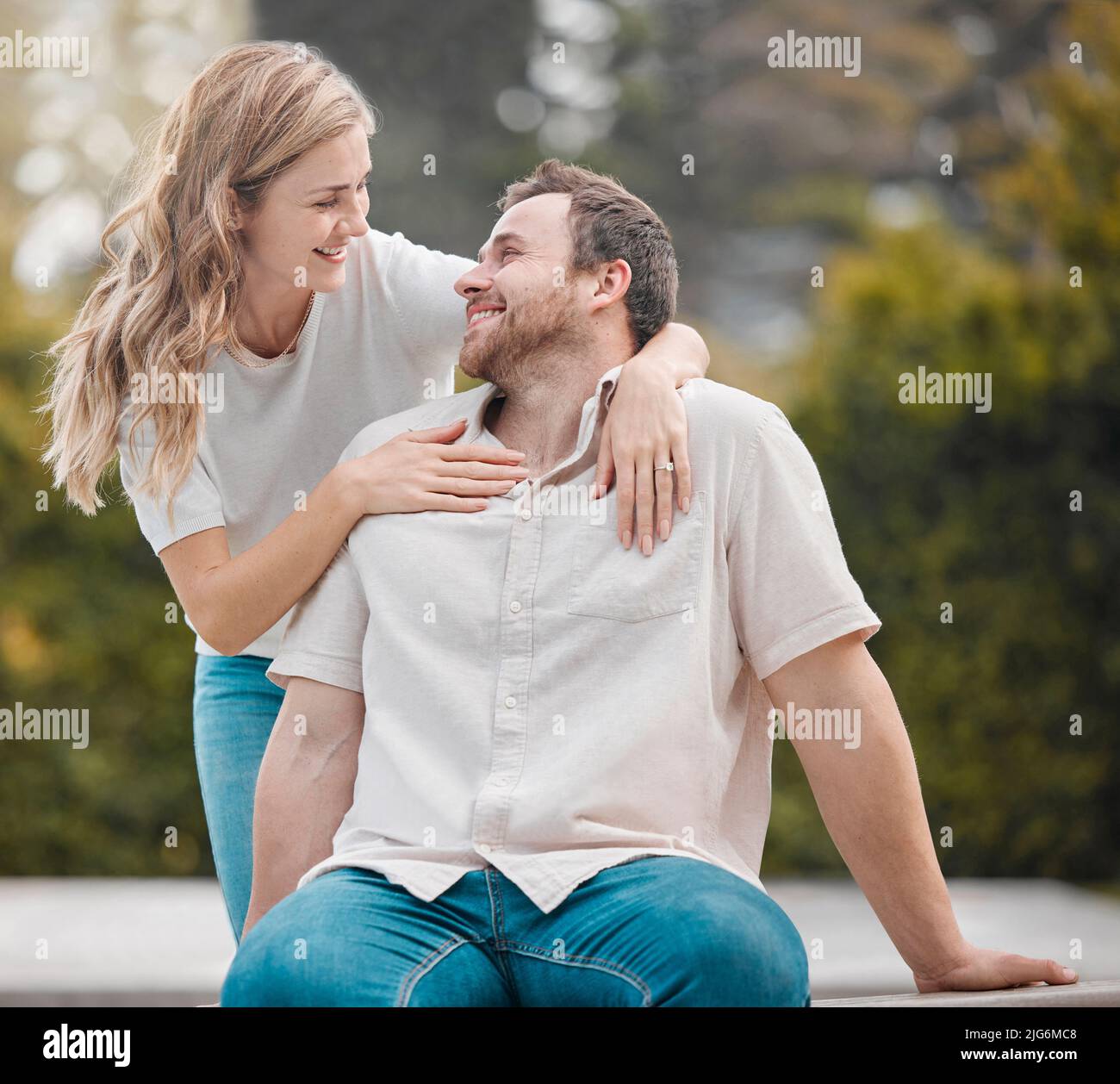 Husband and wife in garden embracing hi-res stock photography and ...