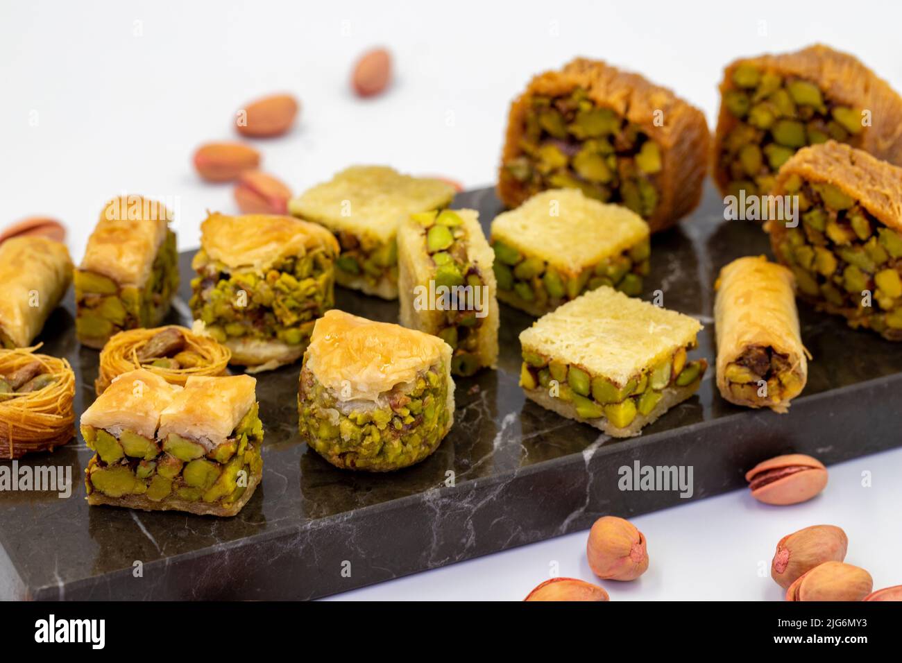 Varieties of pistachio baklava. Variety of baklava isolated on white ...