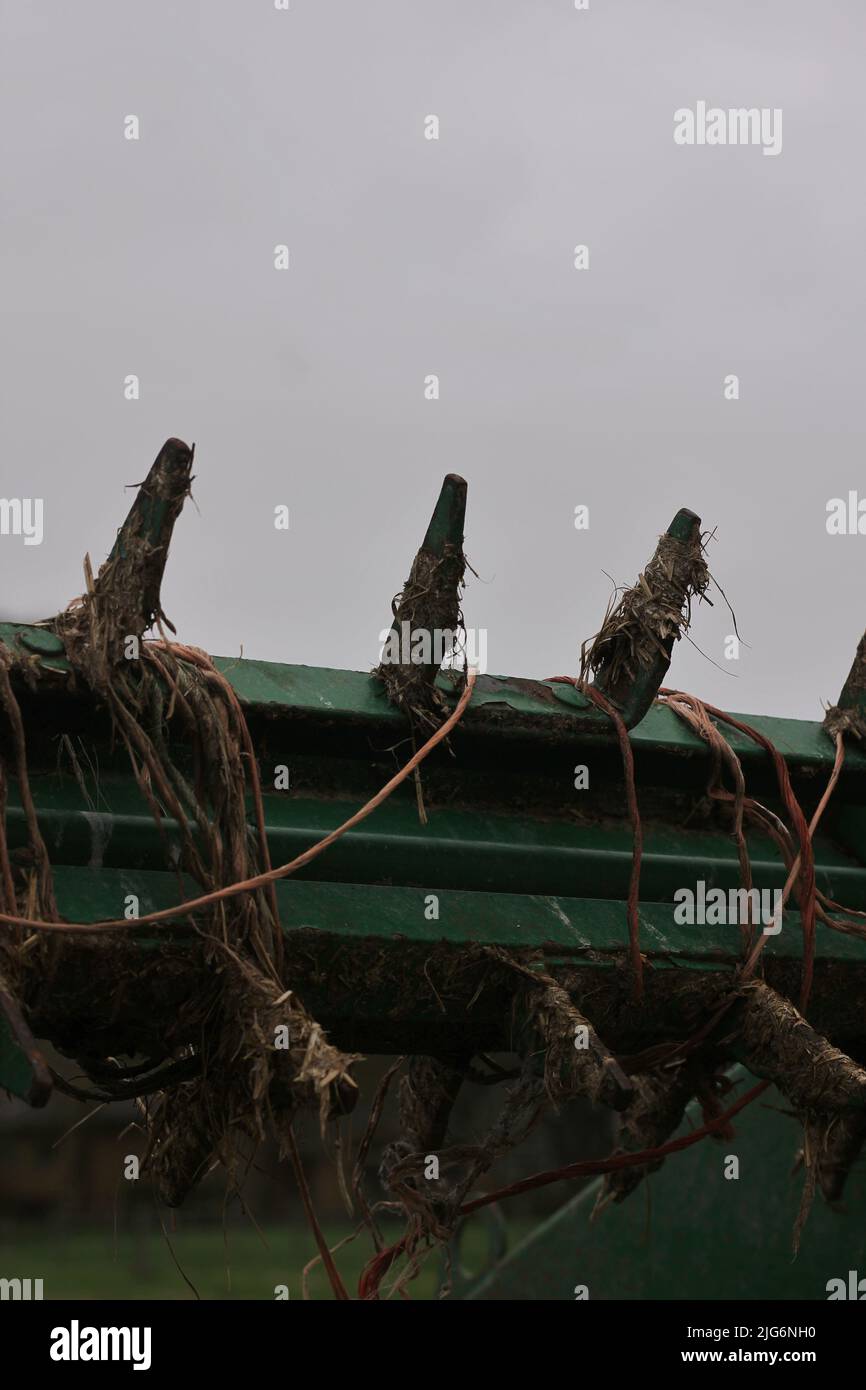 Closeup of the industrial strength spikes on the farm equipment and ...