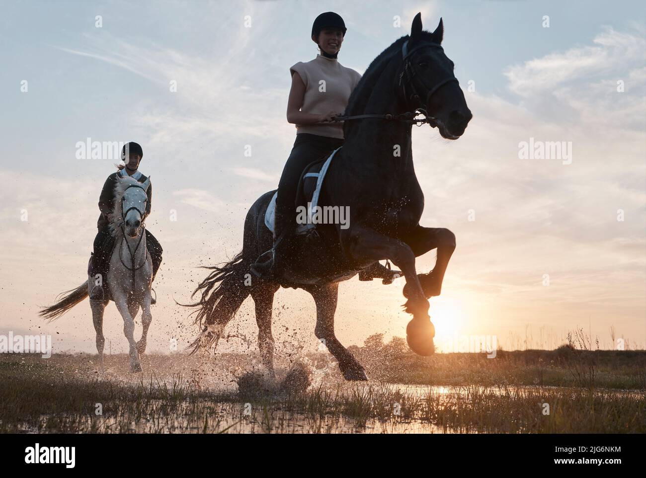 Two people horseback riding hi-res stock photography and images - Alamy