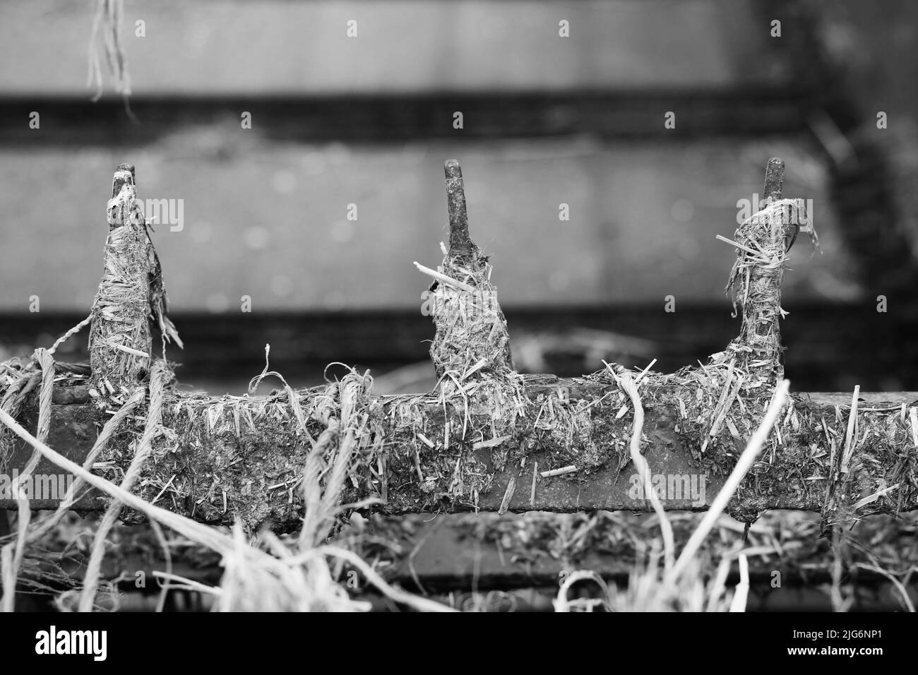 Closeup of the industrial strength spikes on the farm equipment and ...
