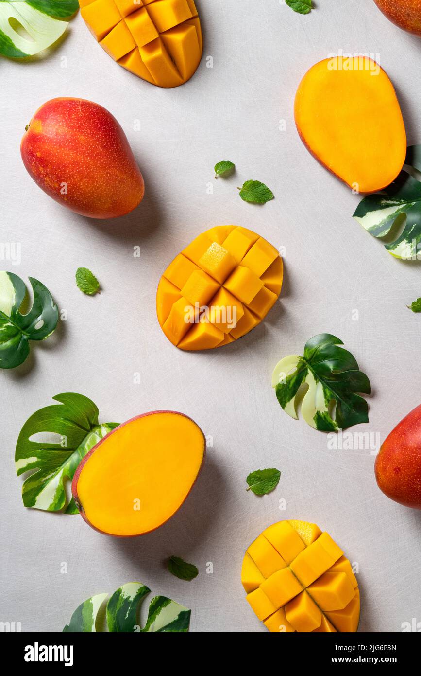 Mango background design concept. Top view of diced fresh mango fruit ...