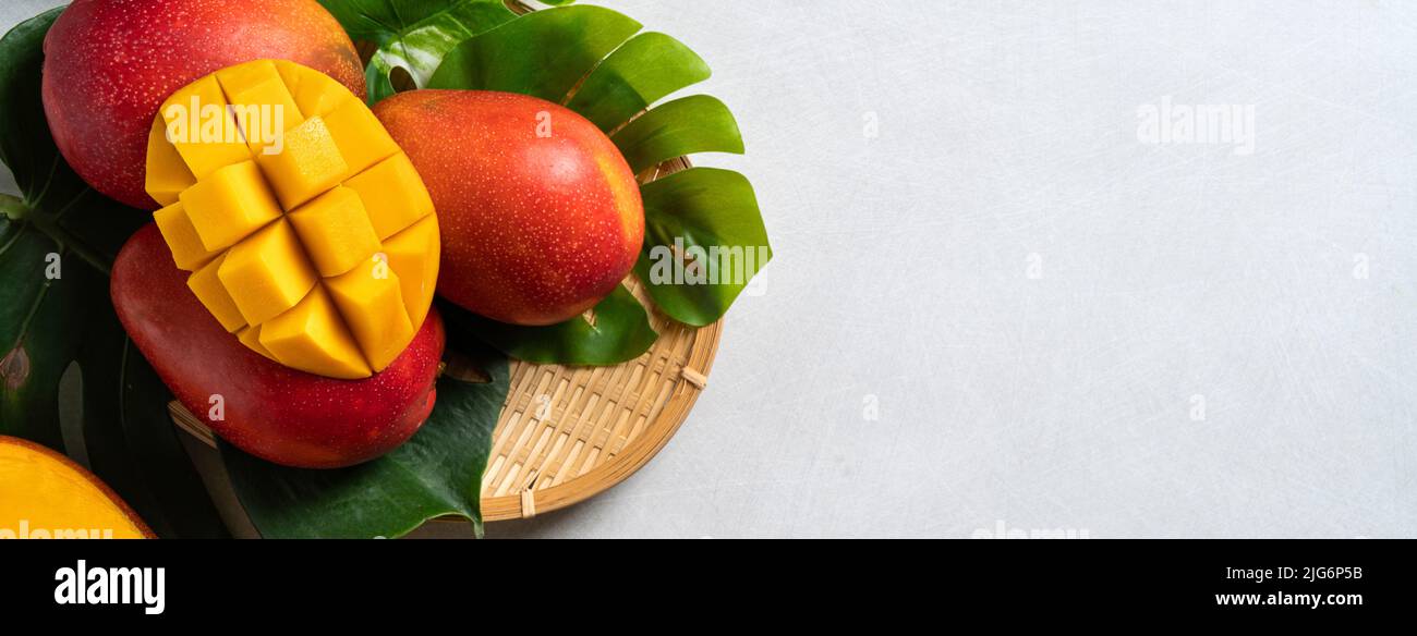Mango background design concept. Top view of diced fresh mango fruit ...