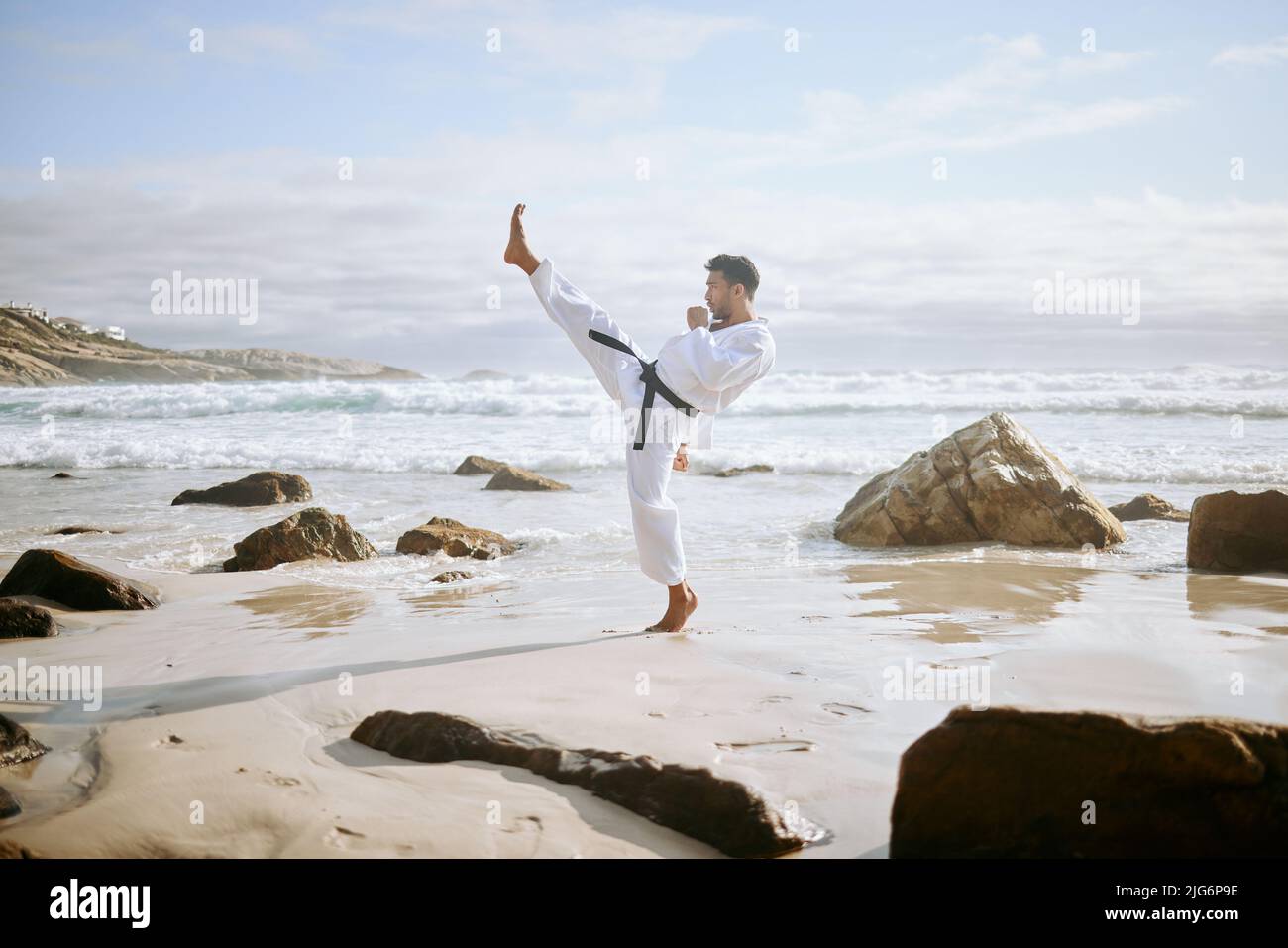 I dont need a weapon, I am one. Shot of a young martial artist ...