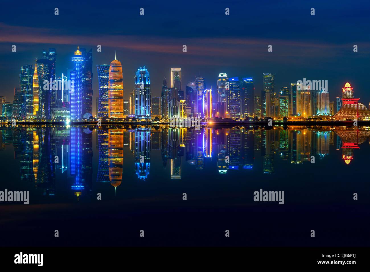 Panoramic skyline of Doha city at night, Qatar Stock Photo - Alamy