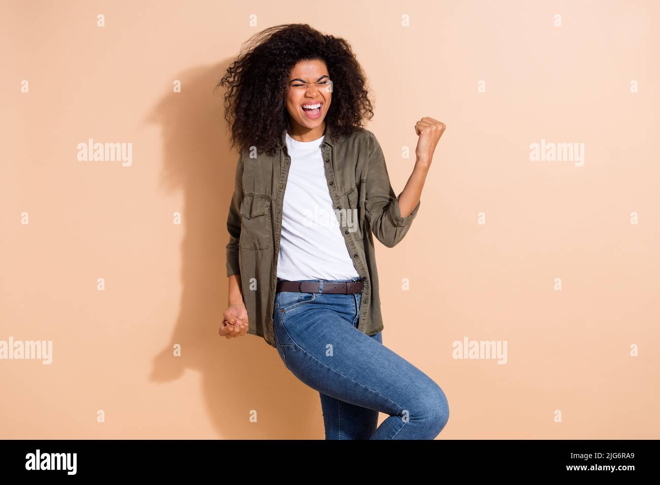 Portrait of attractive lucky overjoyed cheerful girl rejoicing great ...