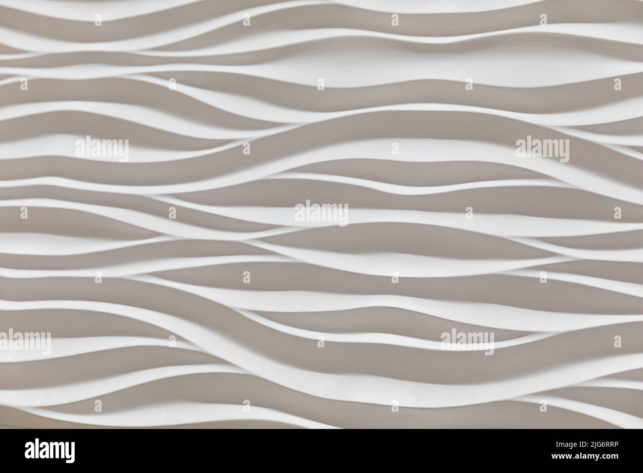 white gypsum panel decorative wave effect Stock Photo - Alamy