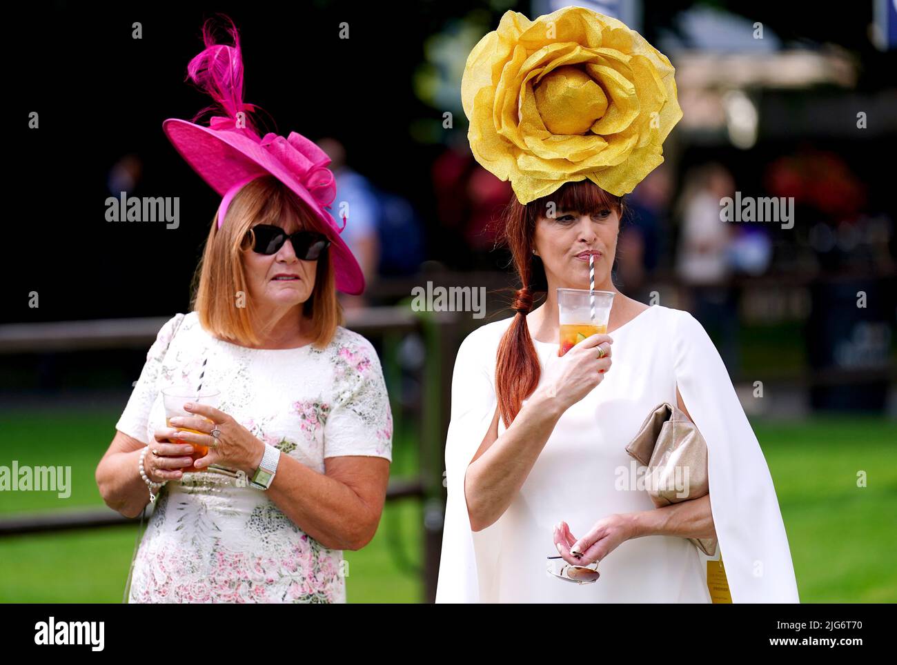 Racegoers enjoy refreshments on Festival Friday of the Moet and Chandon ...