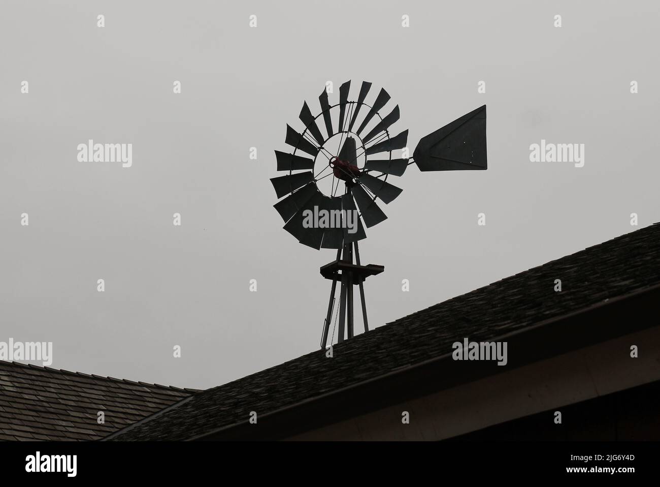 Iconic American wind mill set against the sky Stock Photo - Alamy