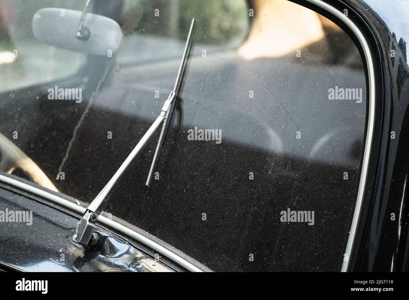 Windshield wiper and dusty glass. Old timer car details. Close up photo ...