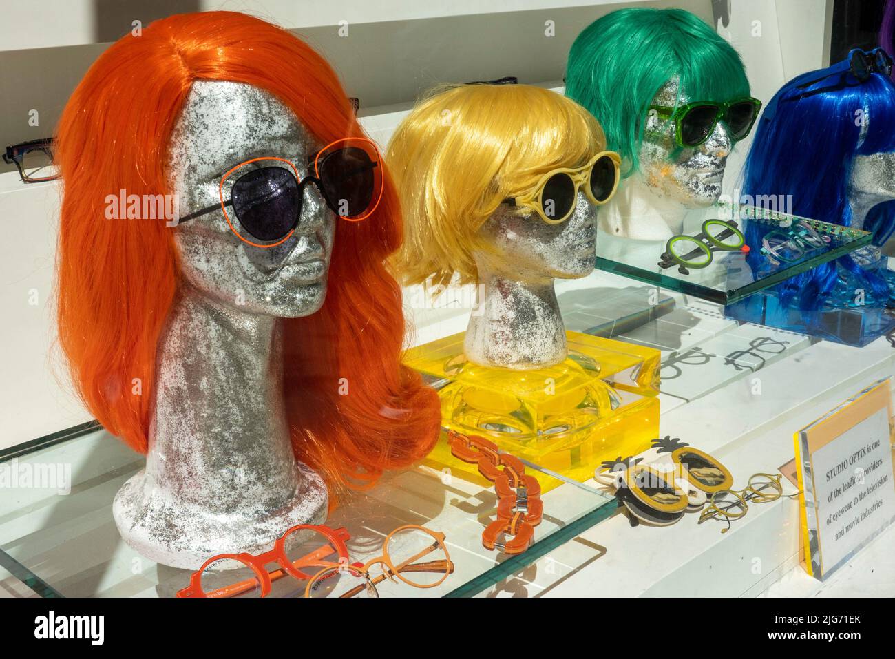 Rainbow color mannequins with wigs and sunglasses during June Pride ...