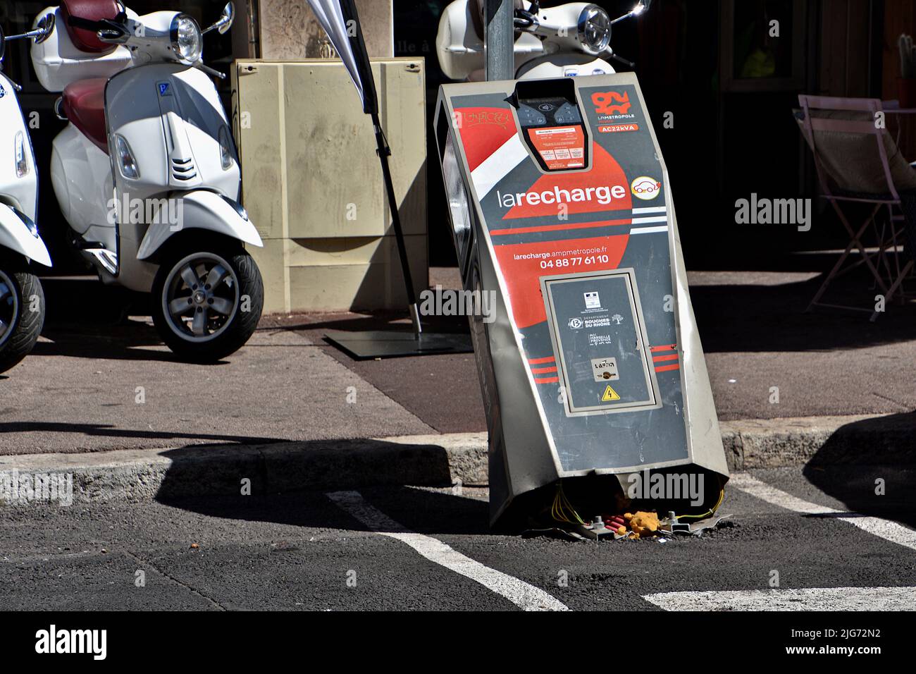 View of a damaged electric car charging station on Rue de la Loge in ...