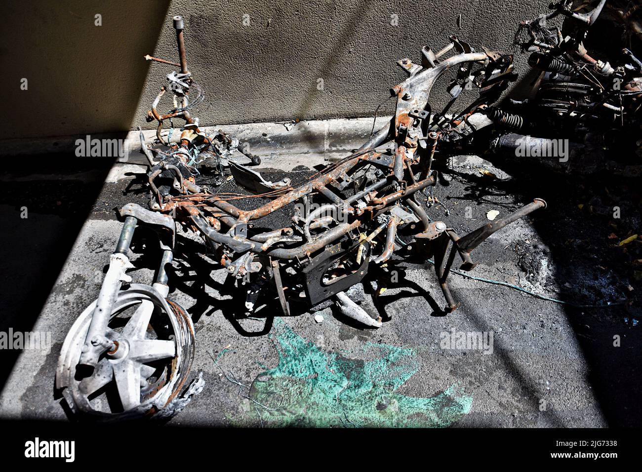 View of a burnt scooter bike that thieves used fire to erase their ...